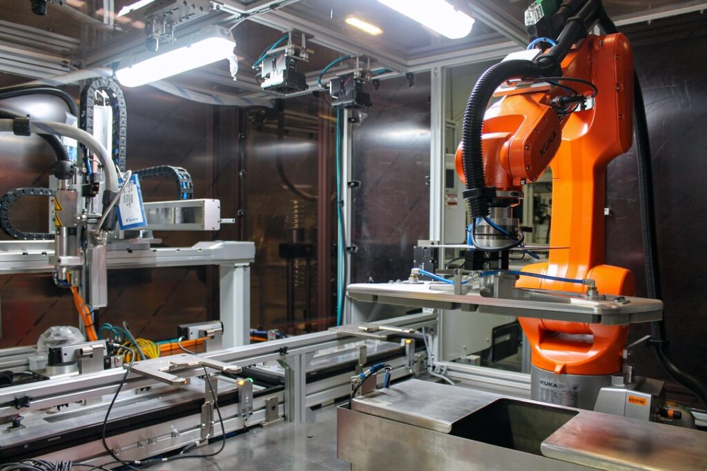 Boosting Manufacturing Efficiency with Robot Cells | AMD Machines