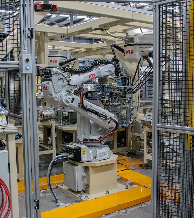Boosting Manufacturing Efficiency with Robot Cells | AMD Machines